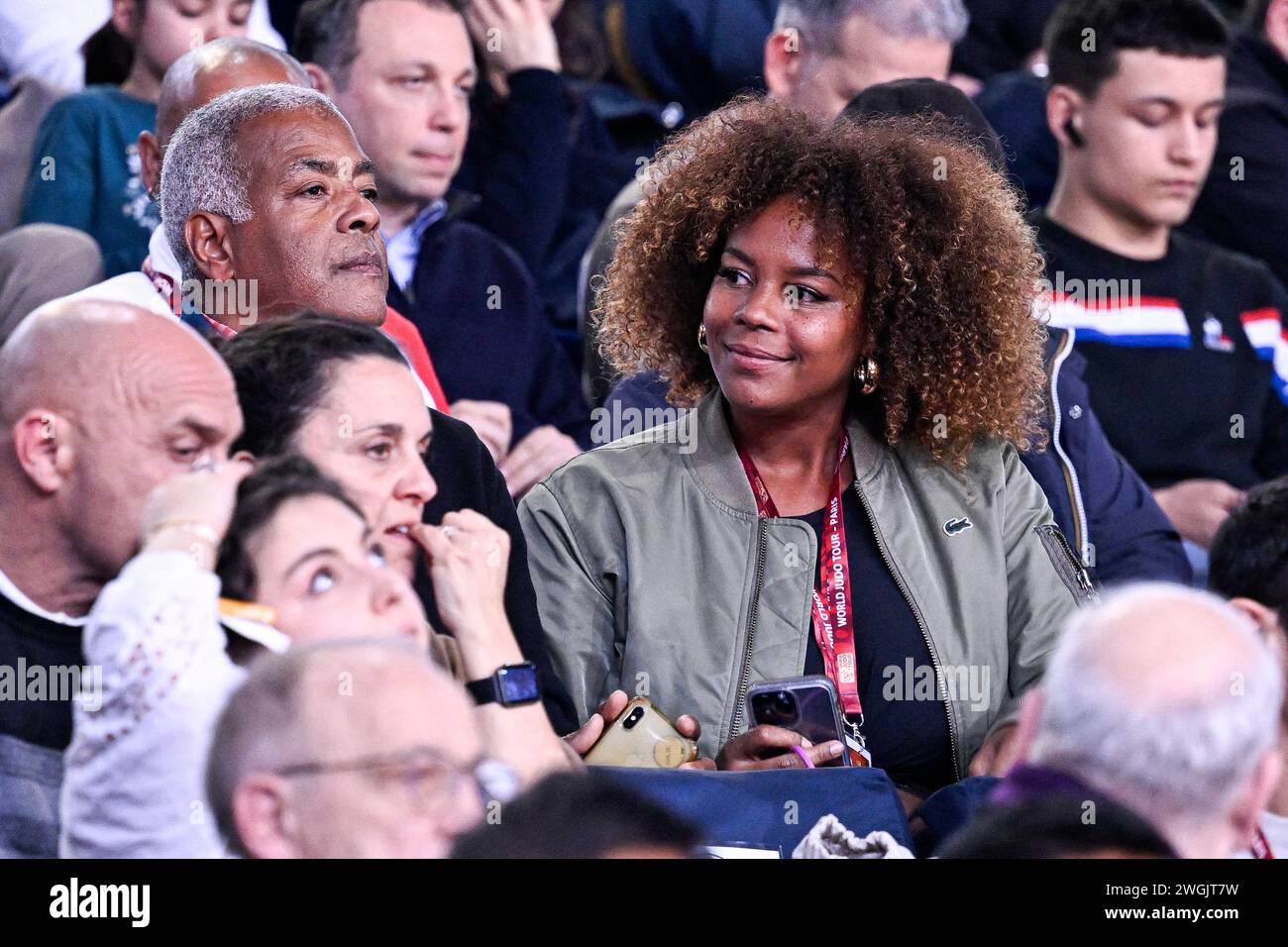 Luthna Plocus wife of Teddy Riner and his father Moise during the Paris ...