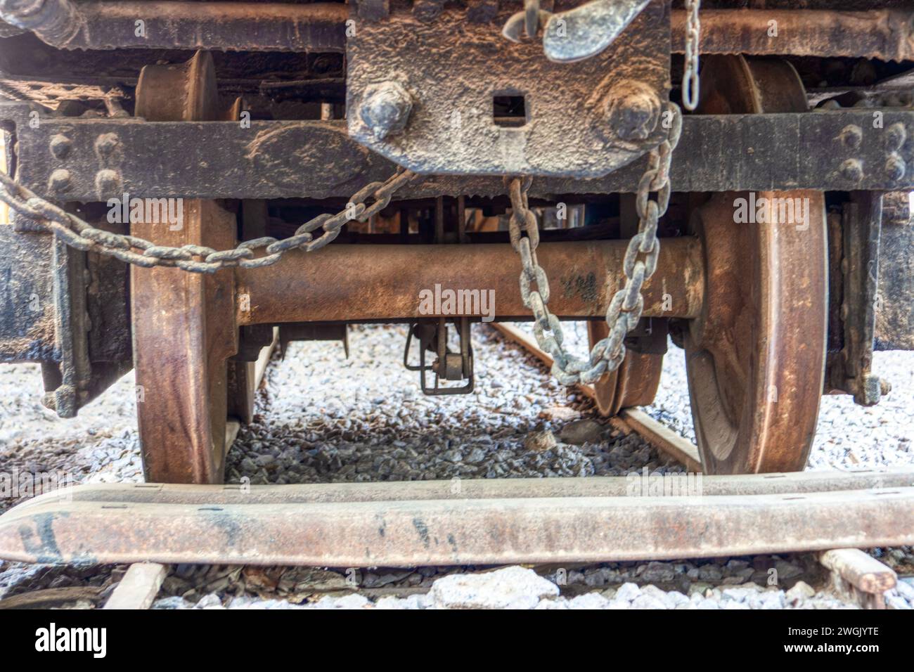 under the wheels of a rusty vintage railway cart from the Rhodesian era ...