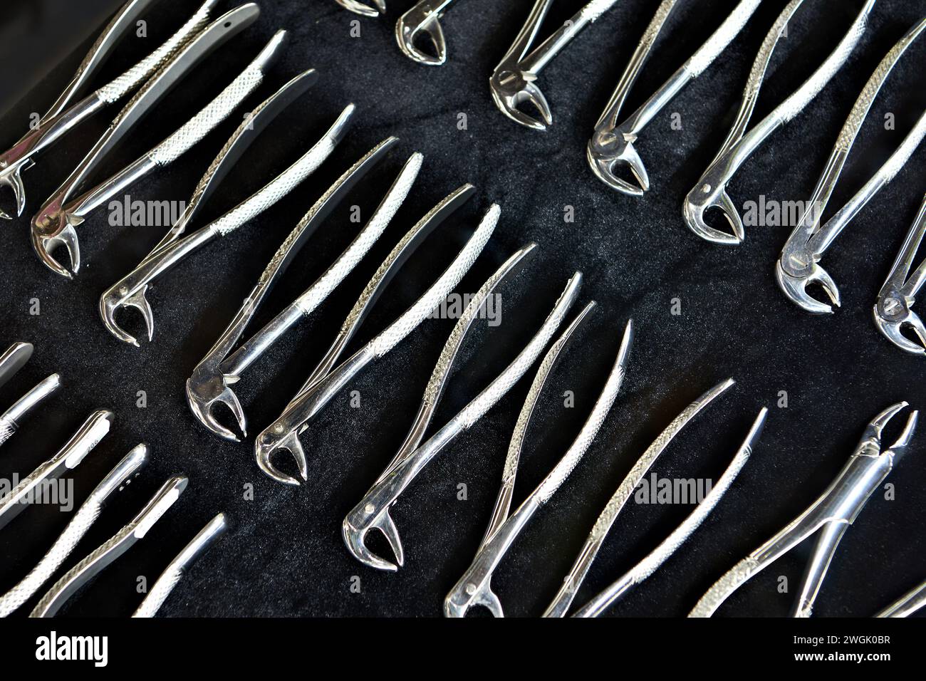 Orthodontic tools on black background hi-res stock photography and ...