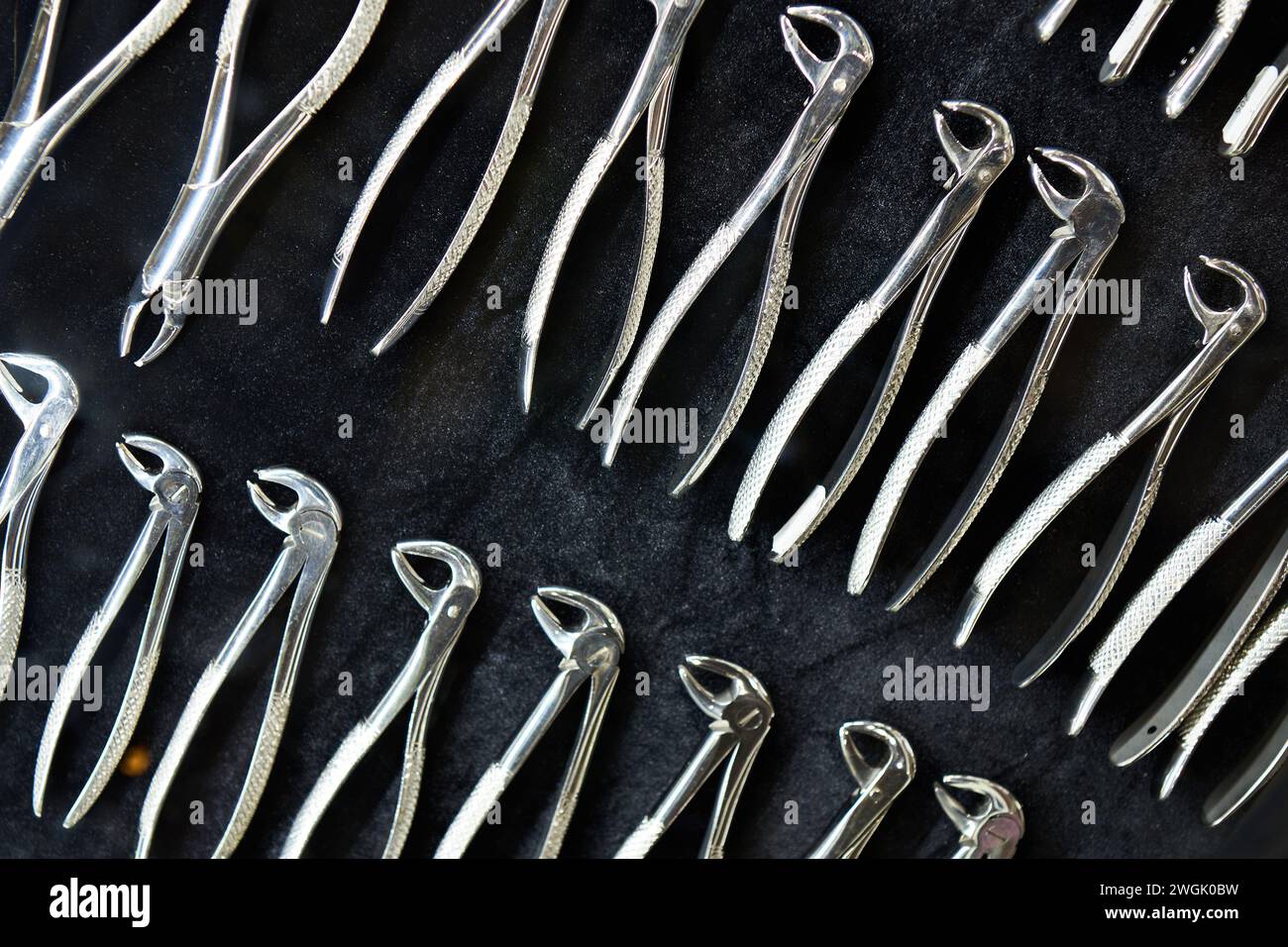 Orthodontic tools on black background hi-res stock photography and ...