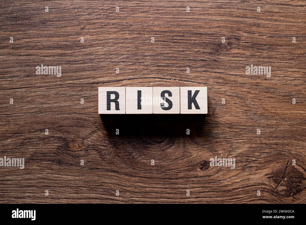 Risk - word concept on building blocks, text Stock Photo - Alamy