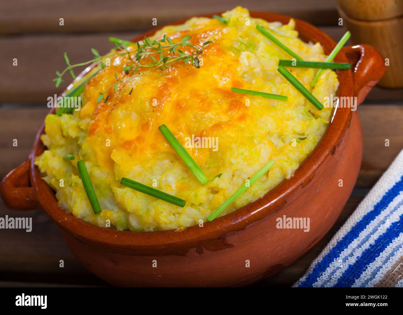 Clay pot of potato casserole Stock Photo - Alamy