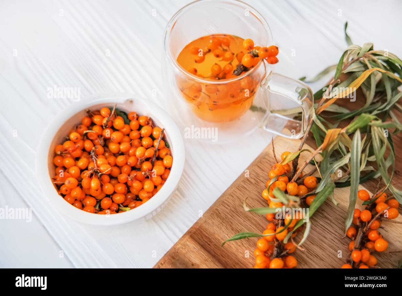Clear teapot with sea buckthorn tea, a medley of flavors and health ...