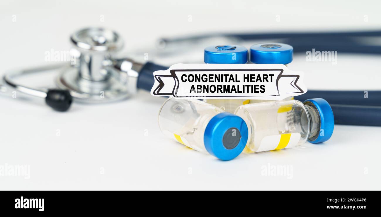 Medical concept. On the table there is a stethoscope, injections and a ...