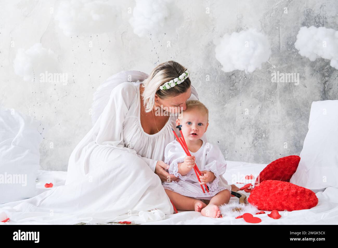 Beautiful mother and her toddler daughter wearing angel costumes Stock ...
