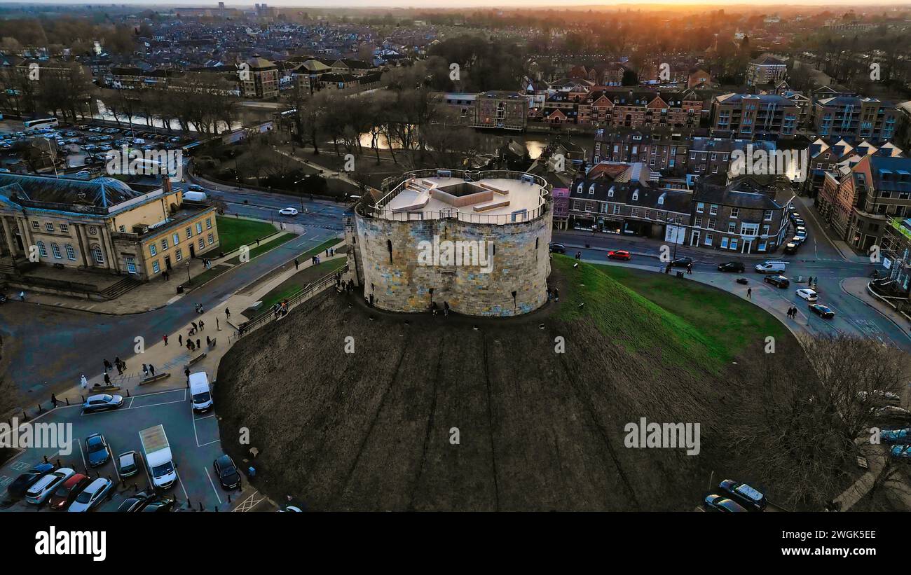 Aerial view of a historic circular stone fortress at dusk, with ...