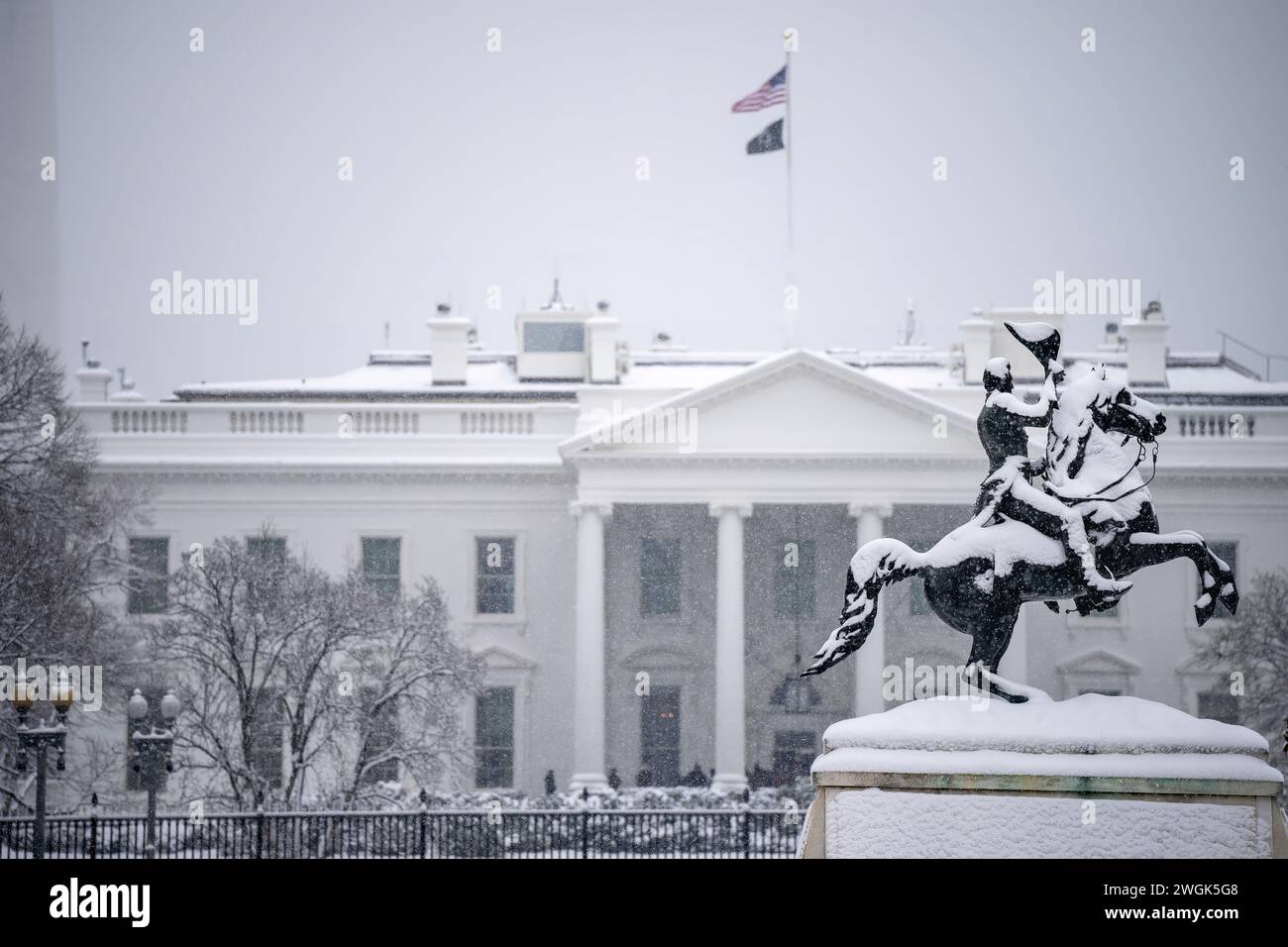 The White House South North grounds is seen during a snowfall, Friday ...
