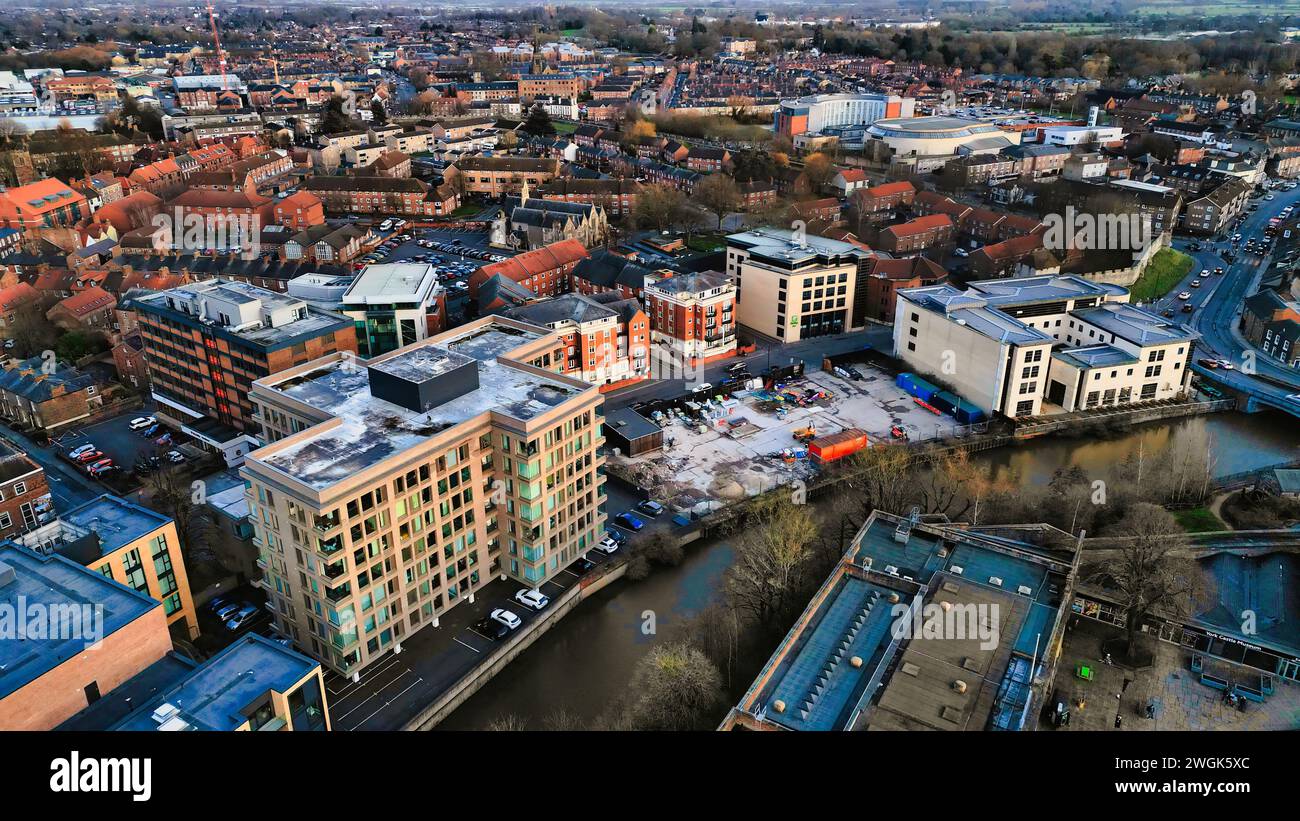 Aerial view of a modern urban cityscape at dusk with buildings and ...