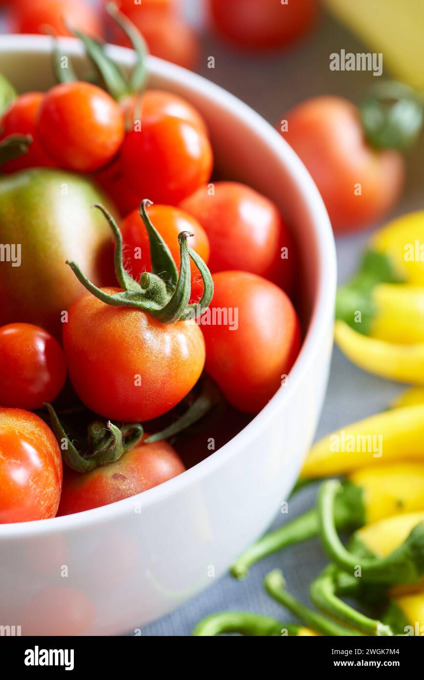 Healthy homemade bio tomatoes and chilli peppers Stock Photo - Alamy