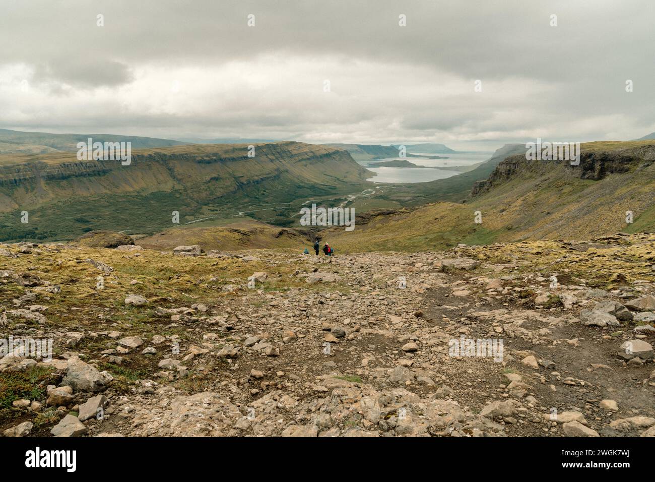 Unidentifiable hikers on the vast section of the Glymur Waterfall trail ...