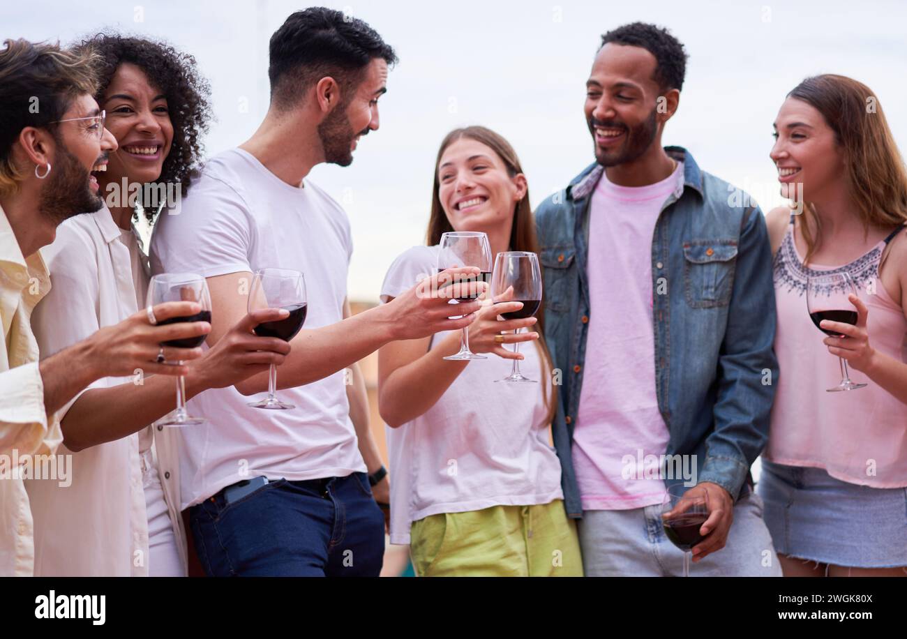 Group friends celebrating together rooftop hi-res stock photography and ...