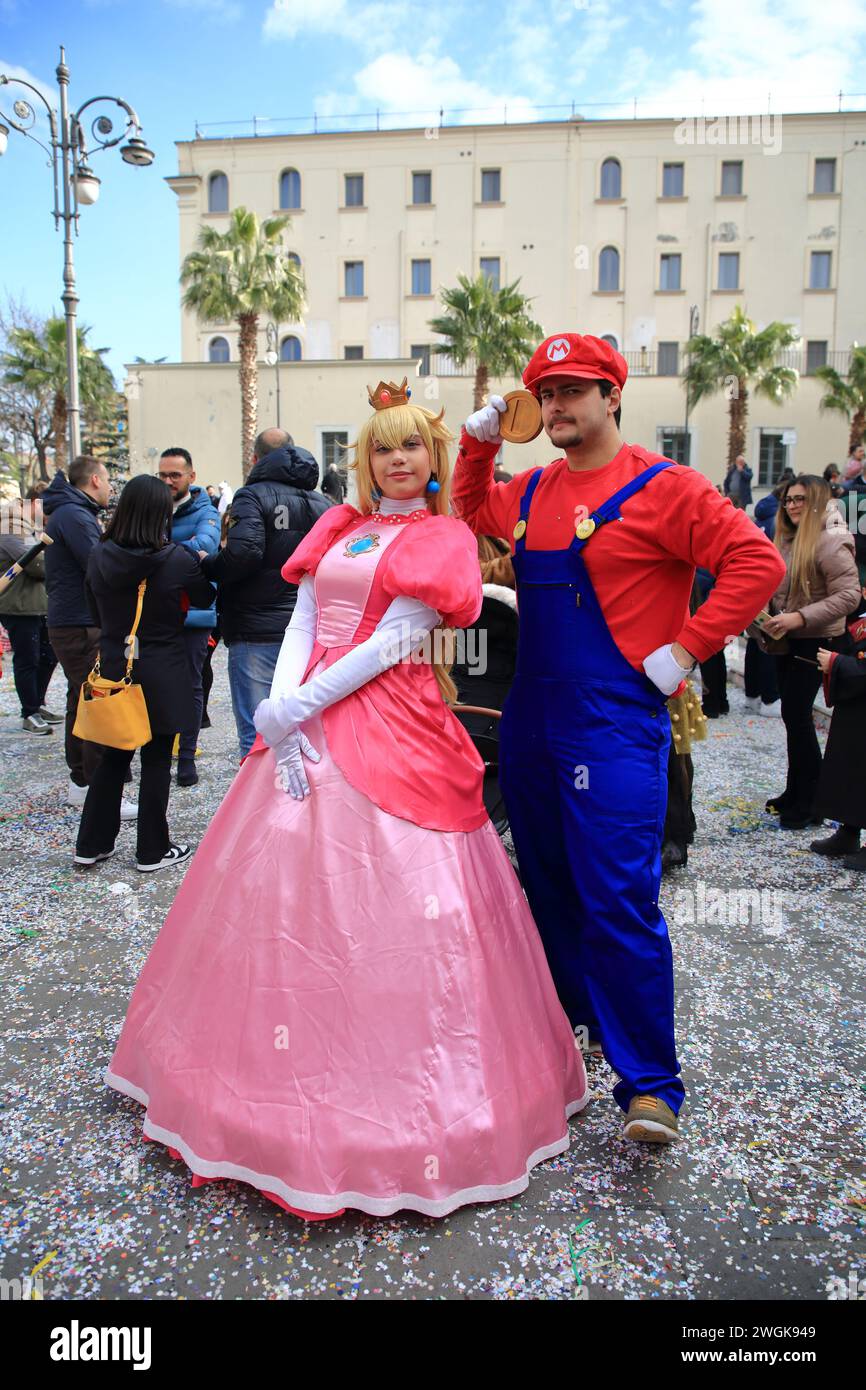 Cosplayer actors wear costumes of famous cartoon characters and ...