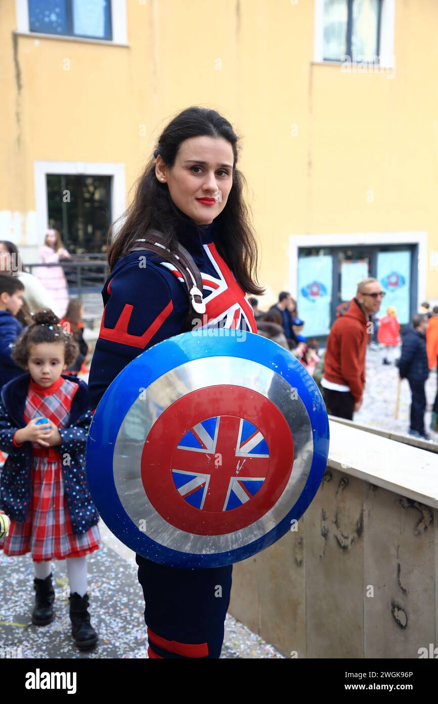 Cosplayer actors wear costumes of famous cartoon characters and ...