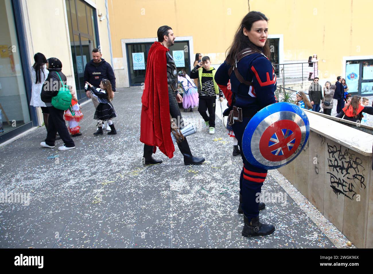 Cosplayer actors wear costumes of famous cartoon characters and ...