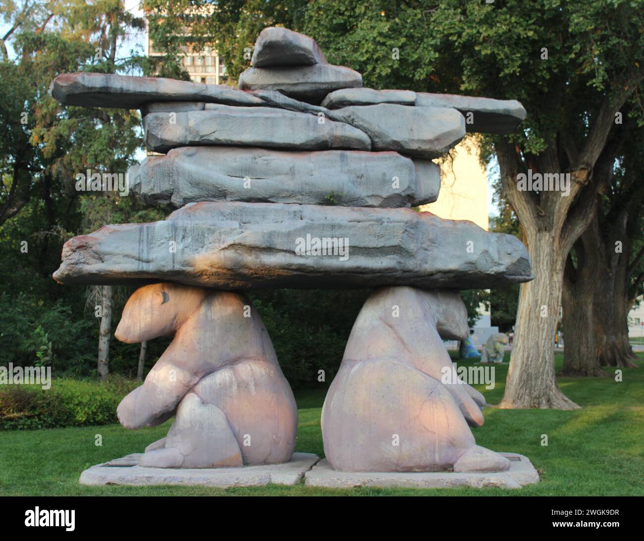 Stylized stone carved sculpture called an Inukshuk by the Inuit and ...