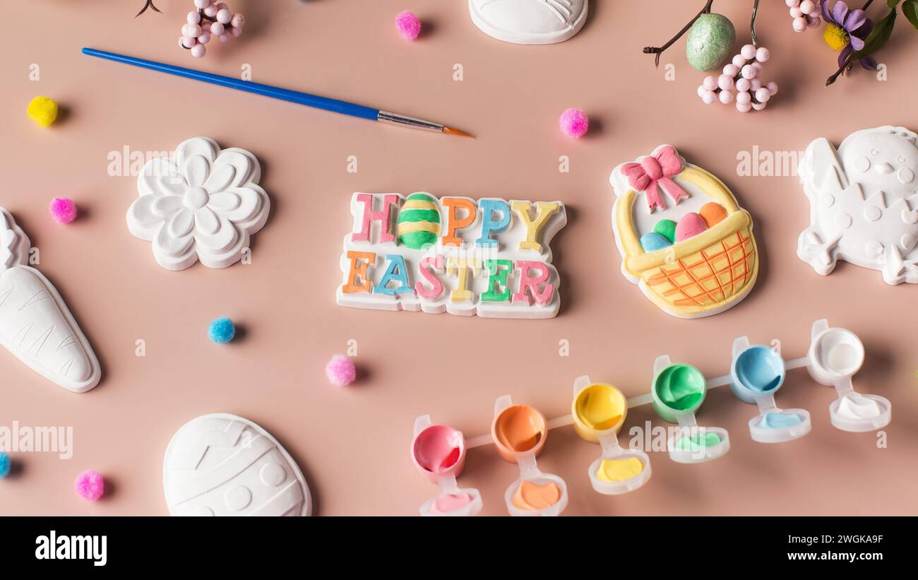 Easter figures made of plaster with paints, the concept of children's ...