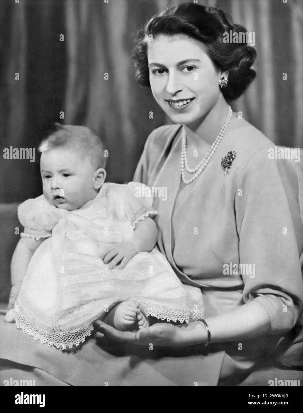 A portrait of a young Charles III, captured alongside his mother ...
