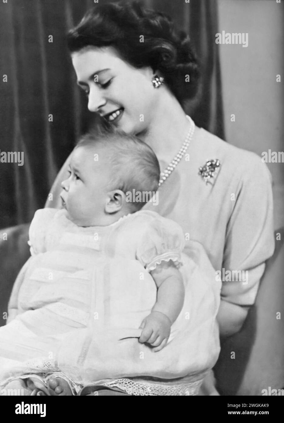 A portrait of a young Charles III, captured alongside his mother ...