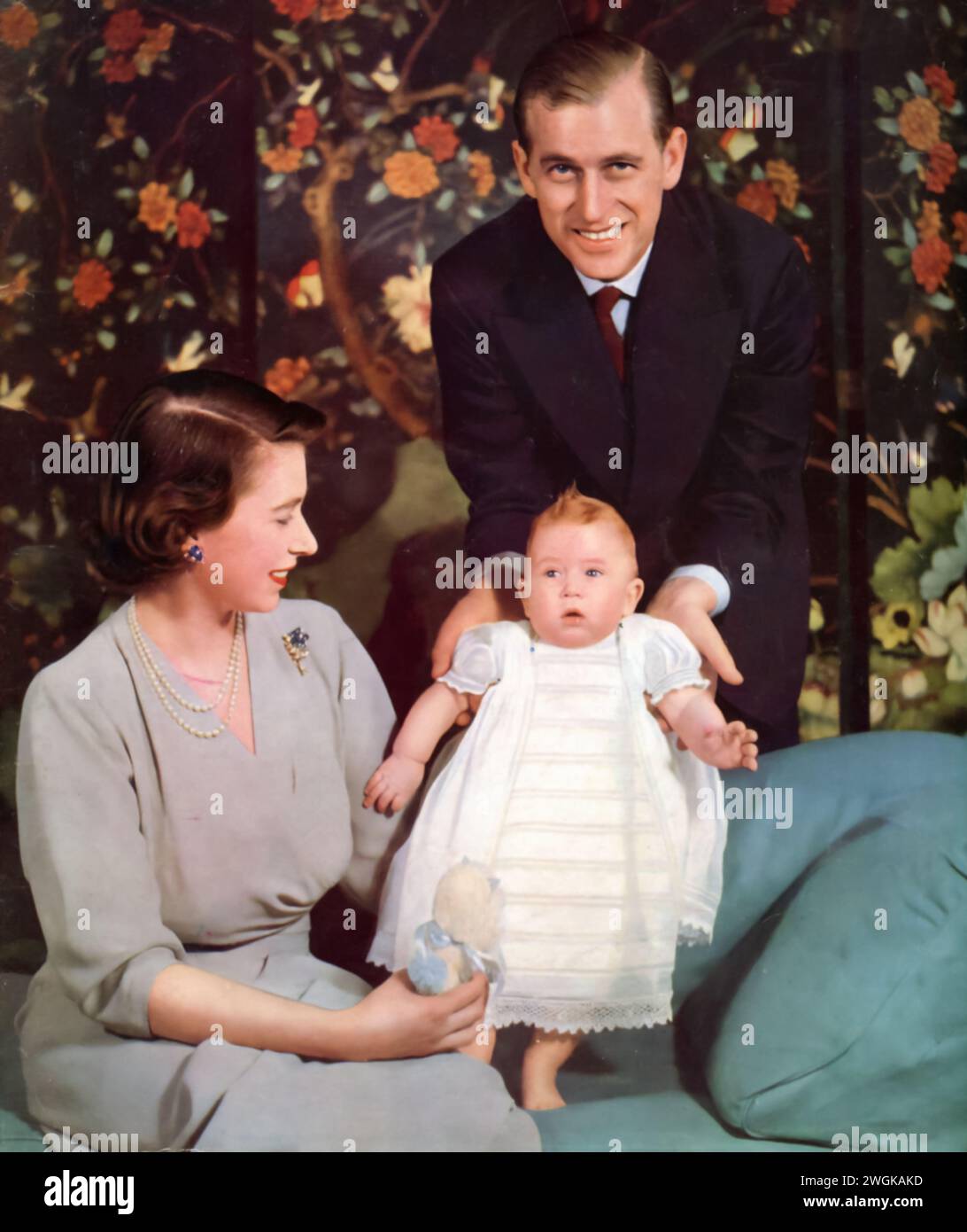 A portrait of Queen Elizabeth II, Prince Philip, and their newborn son ...