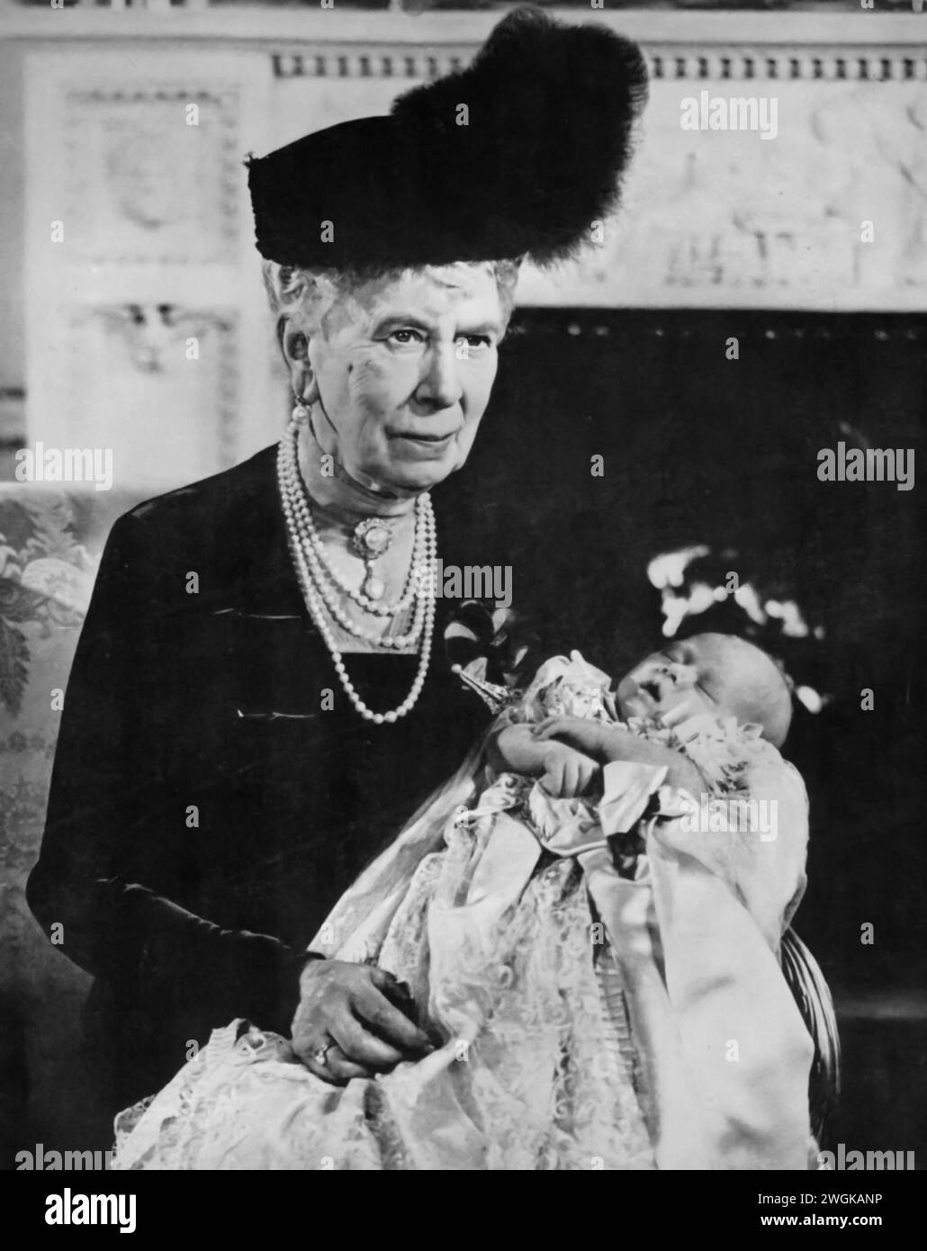 Portrait of Queen Mary holding her newly born great-grandson, Charles ...