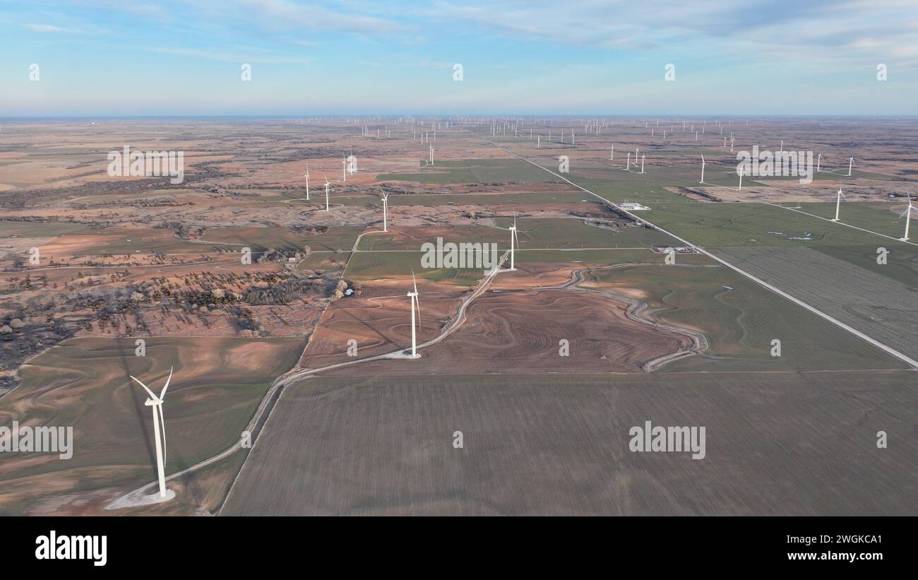 A cluster of wind turbines standing in a grassy field Stock Photo - Alamy