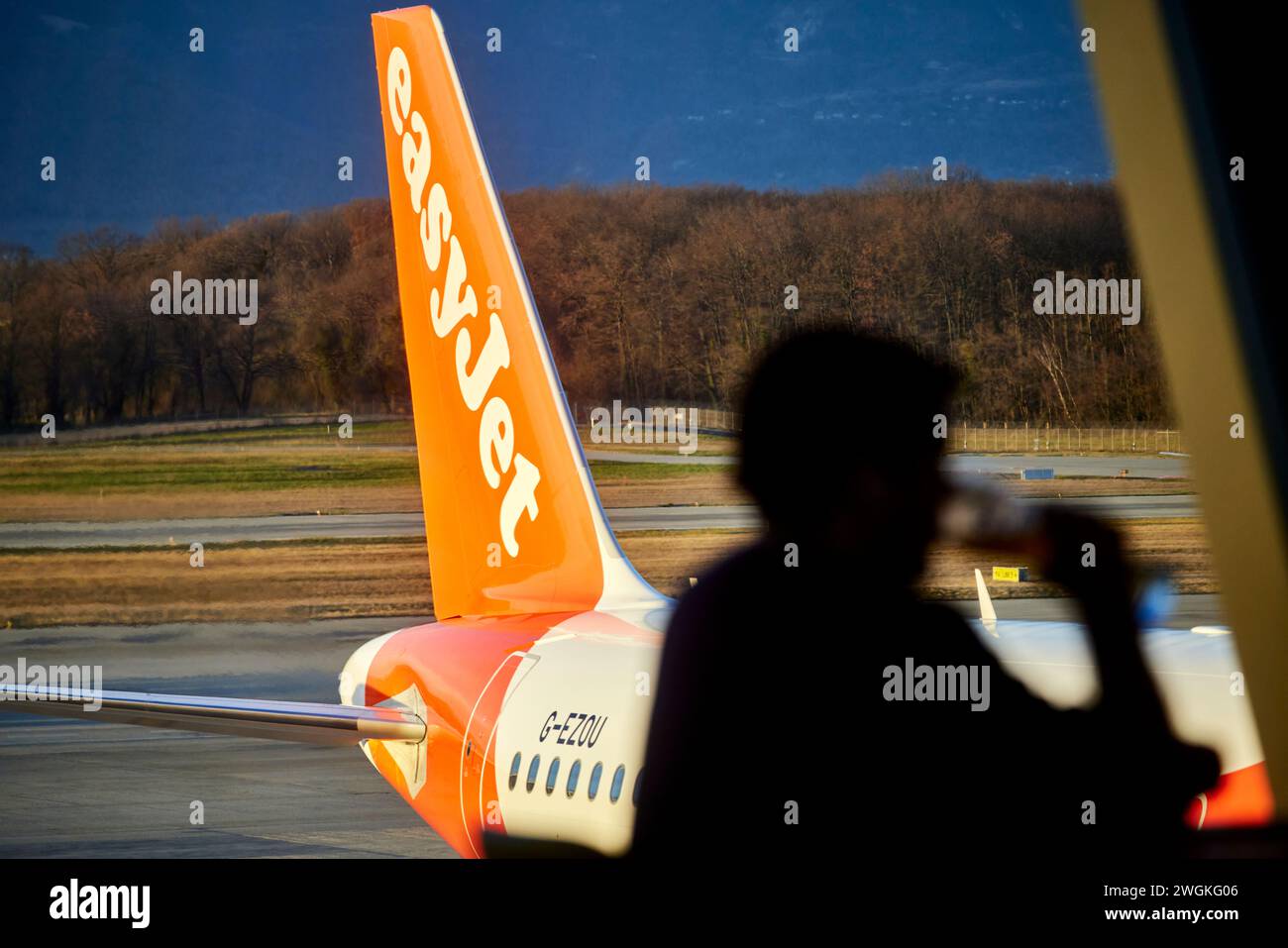 Geneva Airport Switzerland, passenger waiting for EasyJet planes at the ...