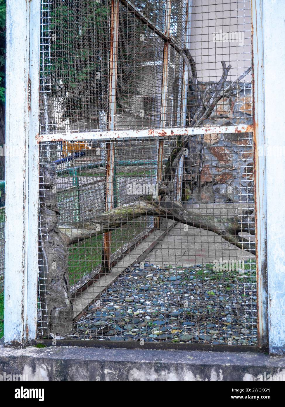 OLYMPUS DIGITAL Outdoor fence at the zoo. Empty cages in the zoo ...