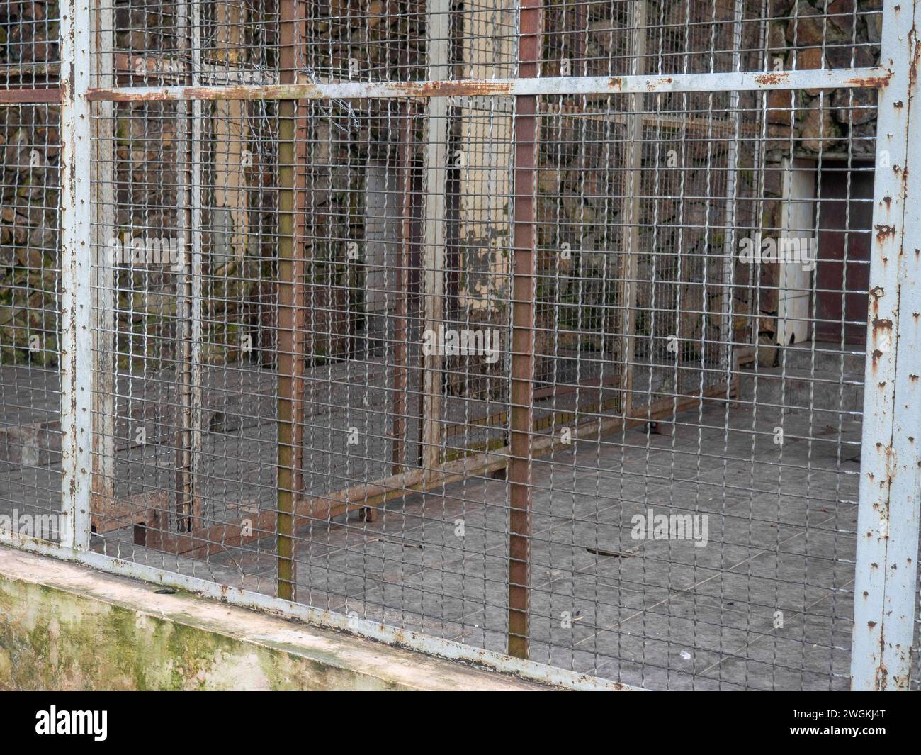 Outdoor fence at the zoo. Empty cages in the zoo. Winter at the zoo ...