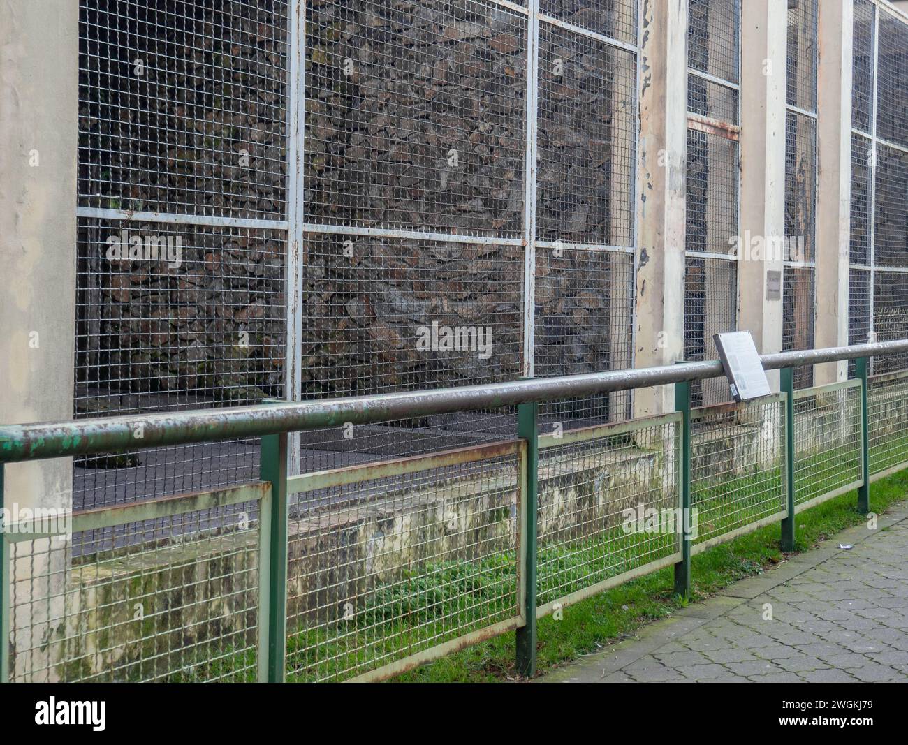 Outdoor fence at the zoo. Empty cages in the zoo. Winter at the zoo ...