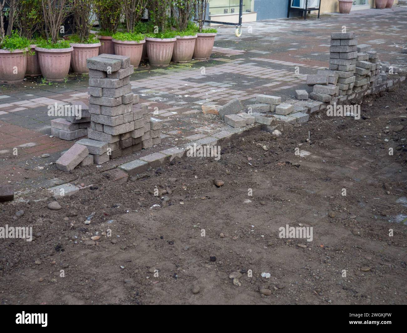 Renovation of the pedestrian zone. Excavation. Laying tiles outdoors ...