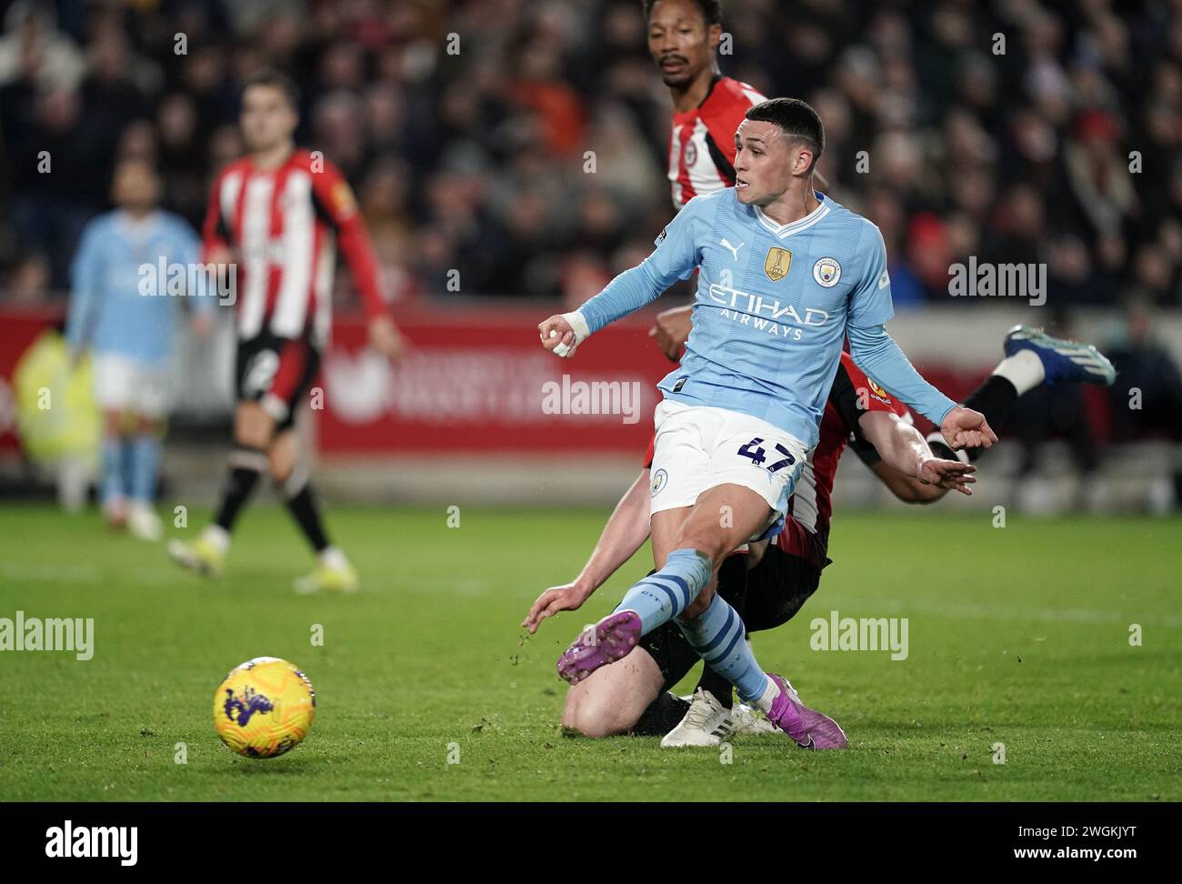 Manchester City's Phil Foden scores their side's third goal of the game ...