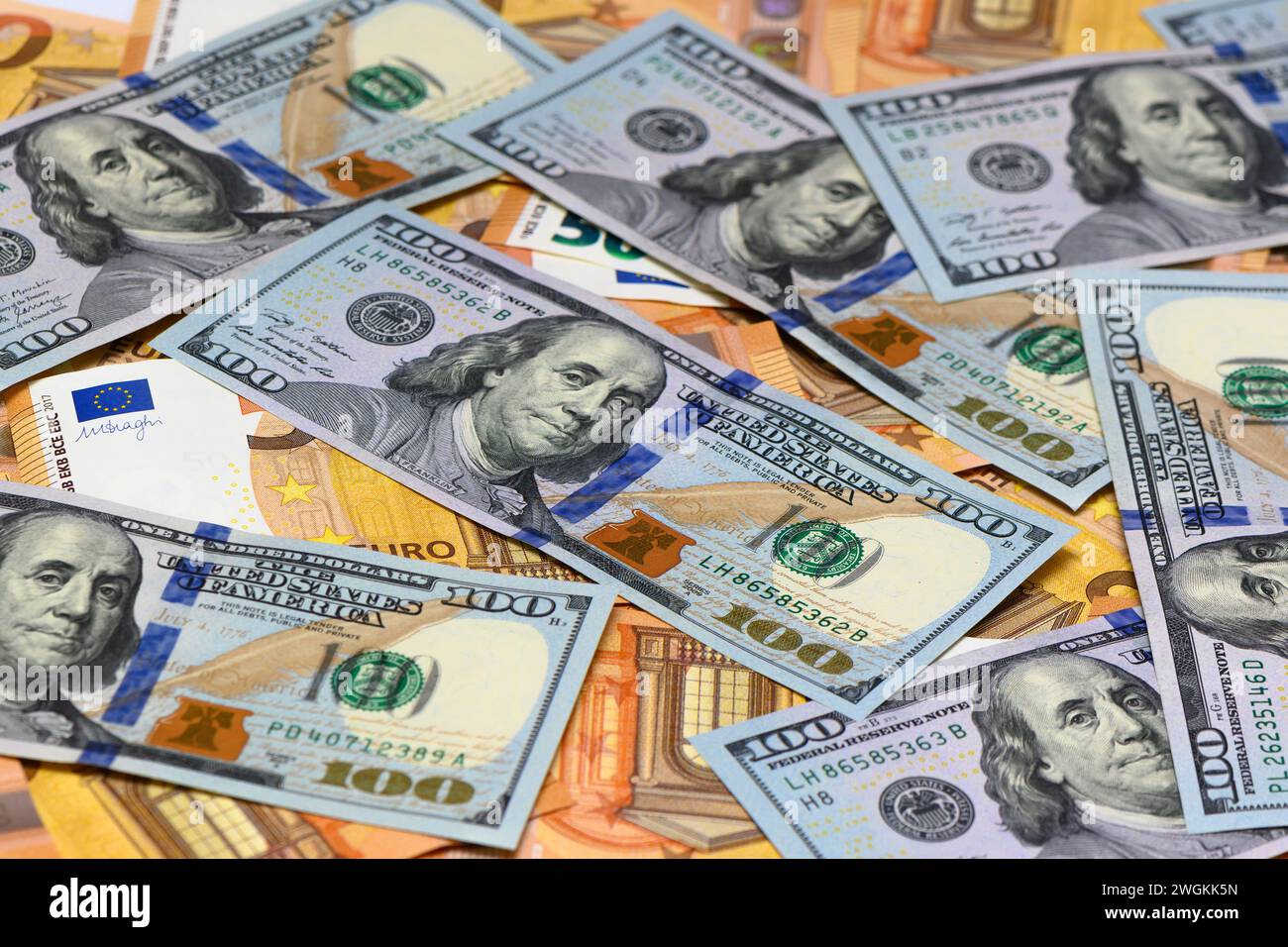 50 euro and 100 dollar bills scattered on the table as a background 16 Stock Photo - Alamy