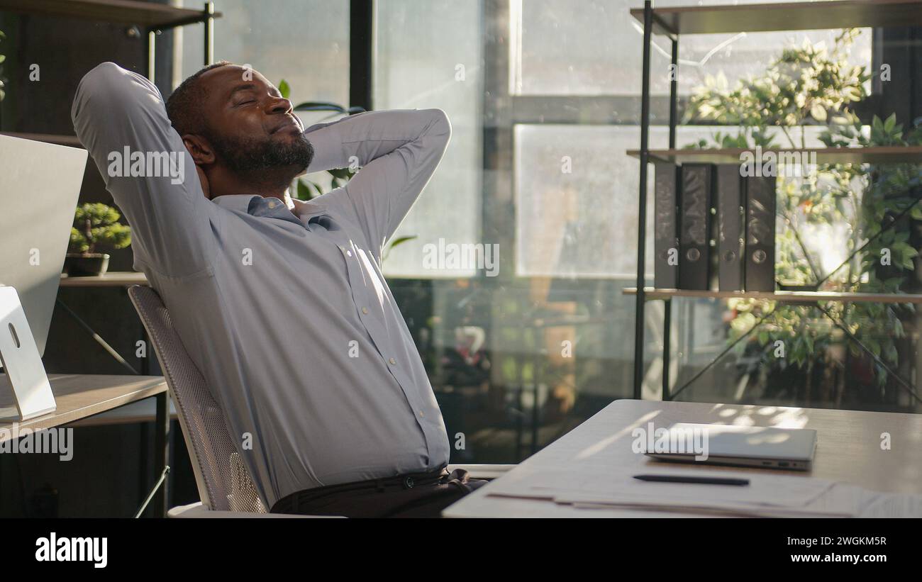 Satisfied businessman African American mature middle-aged 45s man ...