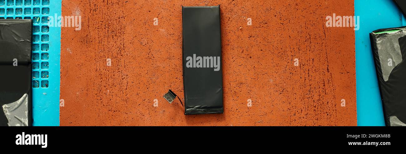 top view of new spare part on work desk in repair workshop, maintenance ...