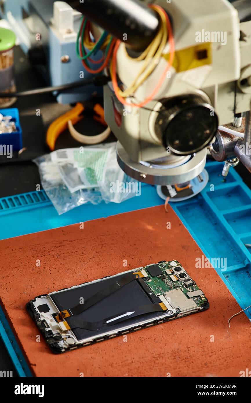 Microscope in electronics repair hi-res stock photography and images ...