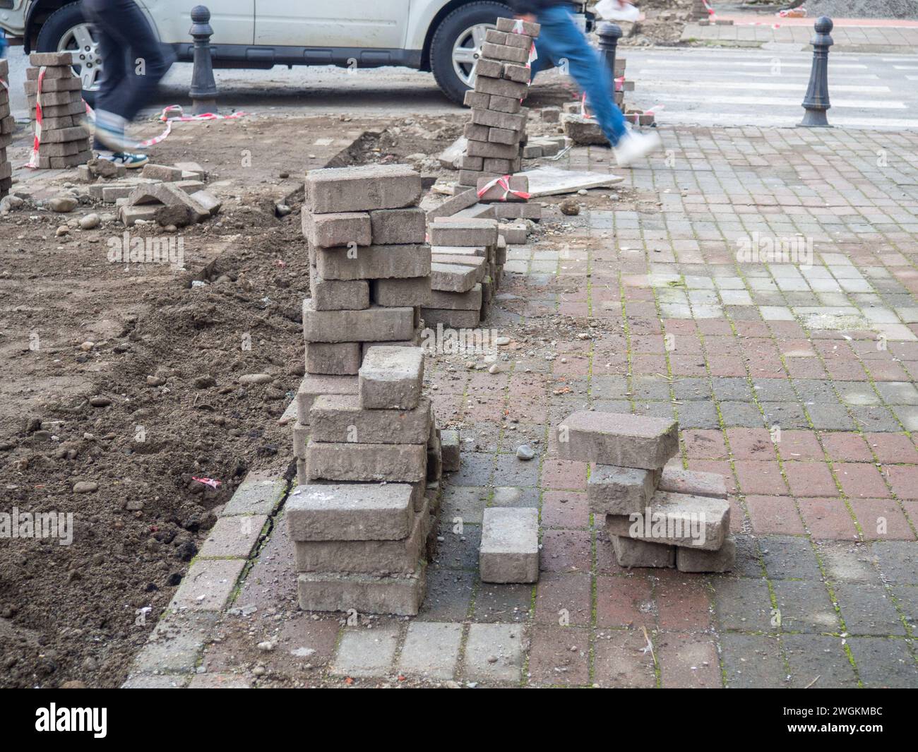 Renovation of the pedestrian zone. Excavation. Laying tiles outdoors ...