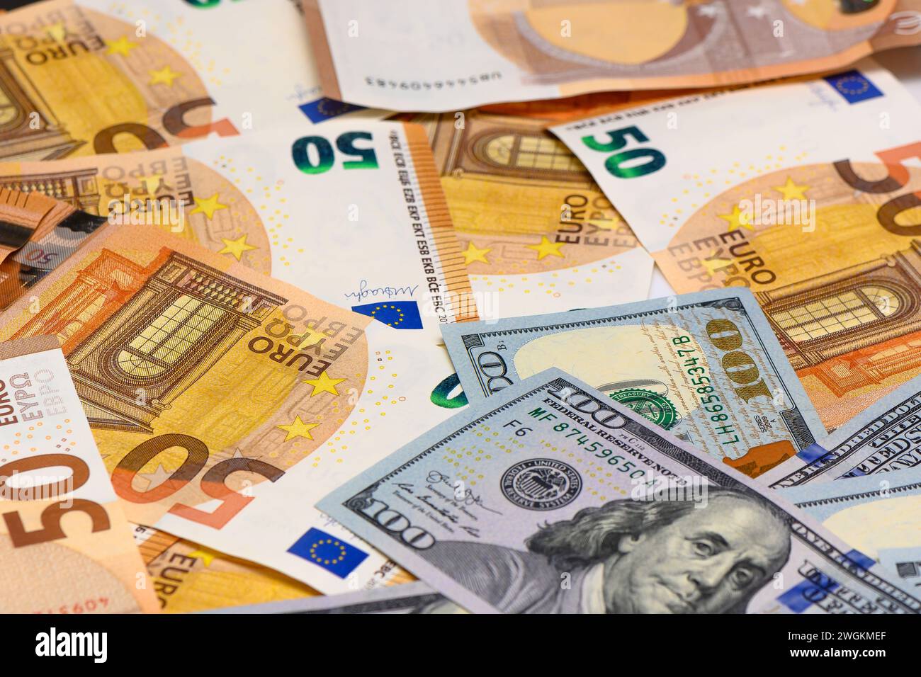 50 euro and 100 dollar bills scattered on the table as a background 20 Stock Photo - Alamy
