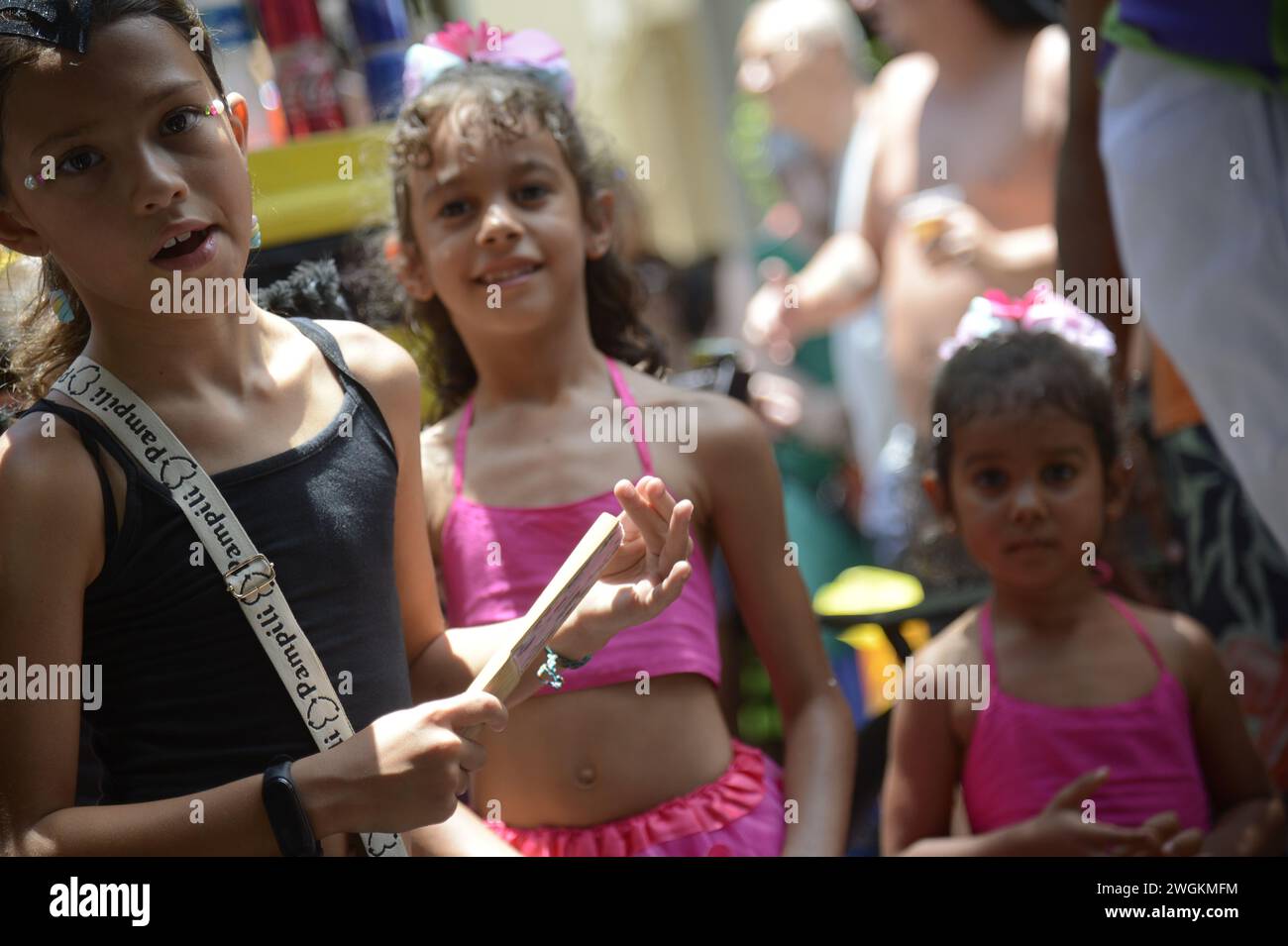Kids street carnival parade in Rio de Janeiro. Revelers wearing ...