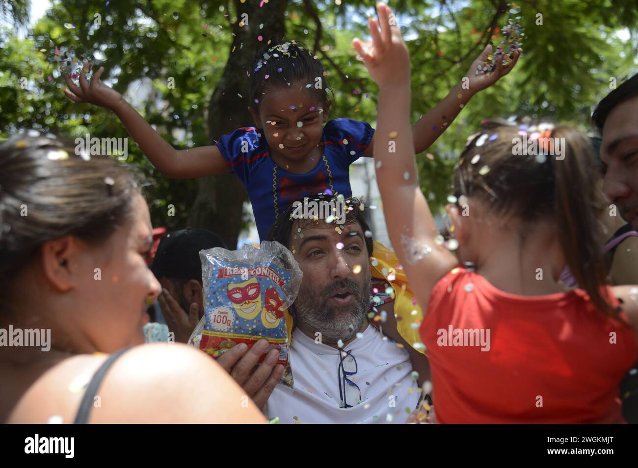 Kids street carnival parade in Rio de Janeiro. Revelers wearing ...