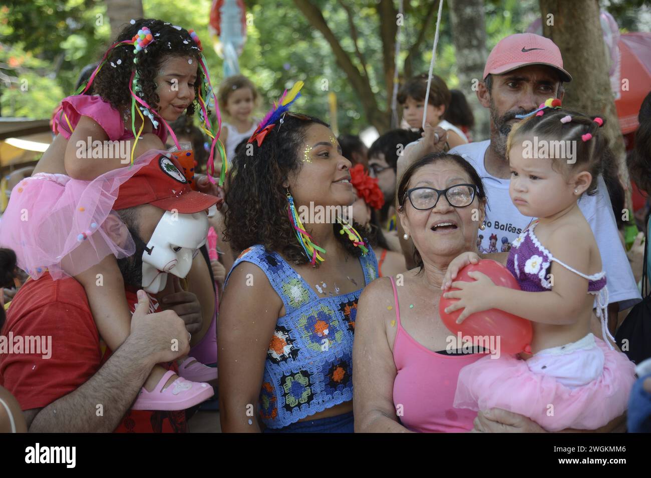 Kids street carnival parade in Rio de Janeiro. Revelers wearing ...