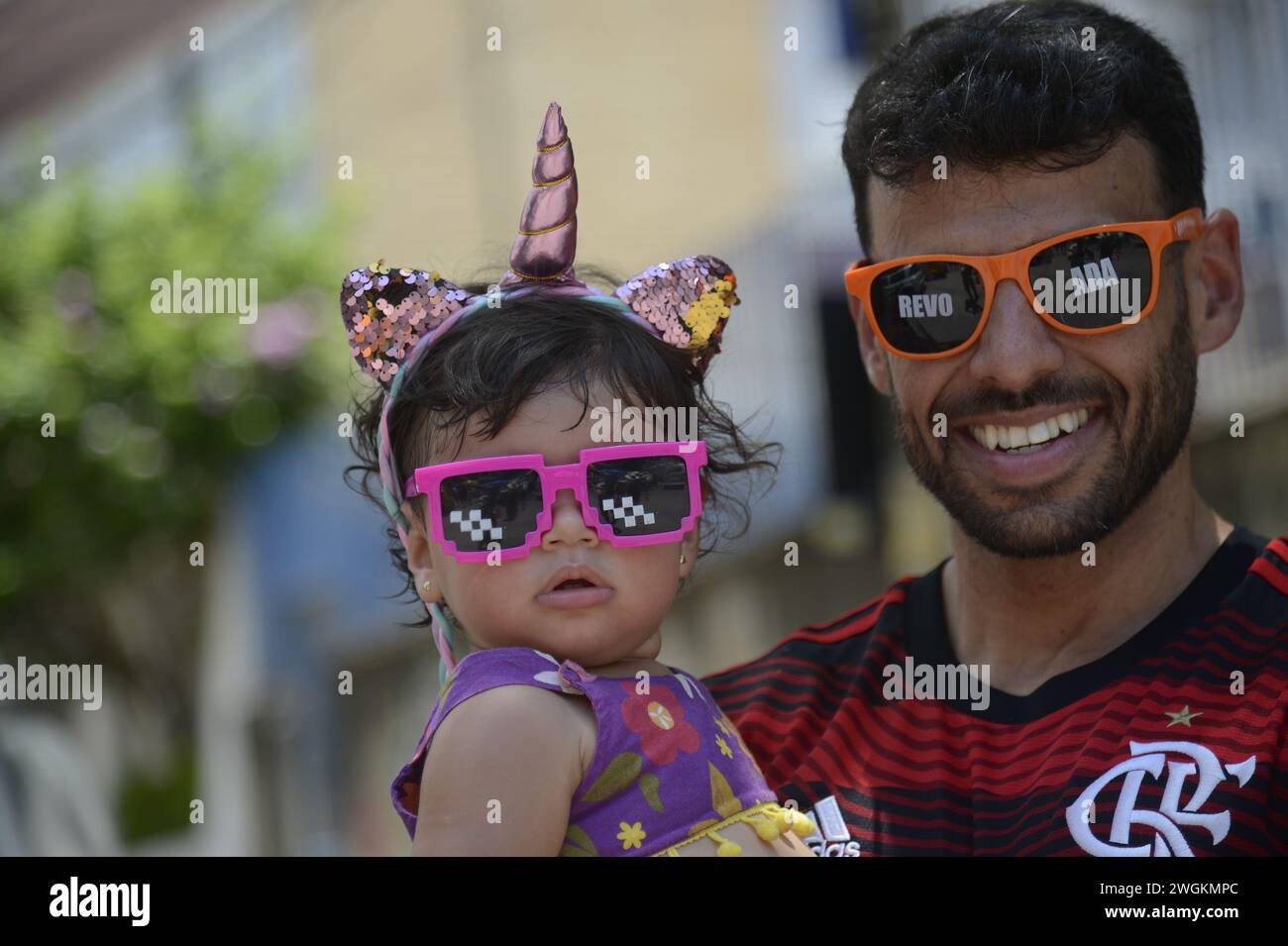 Kids street carnival parade in Rio de Janeiro. Revelers wearing ...