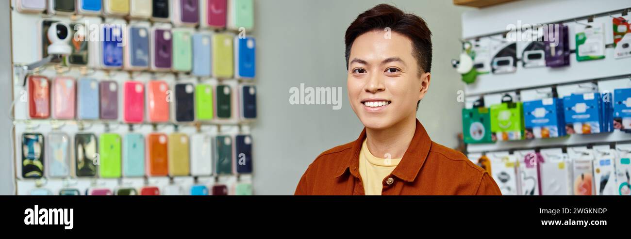 smiling successful asian entrepreneur looking at camera in private ...