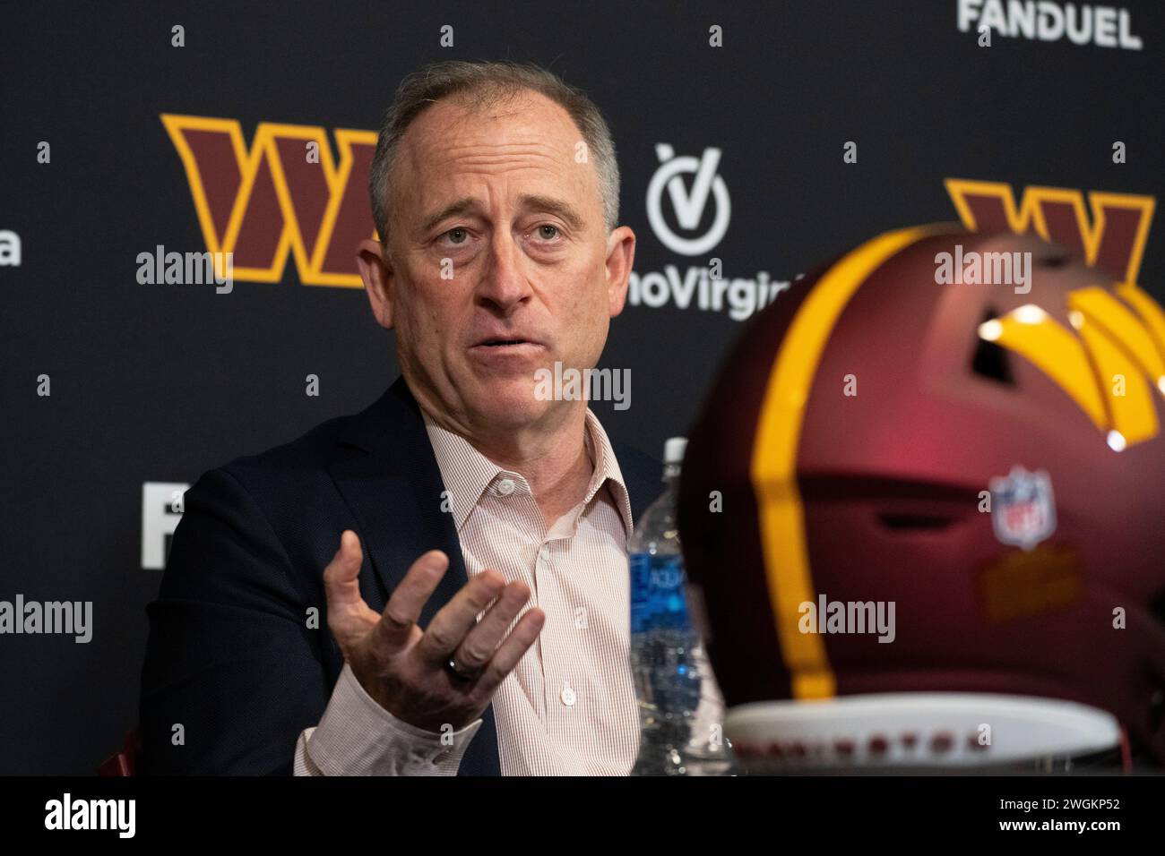 Washington Commanders managing partner Josh Harris speaks during an NFL football news conference ...