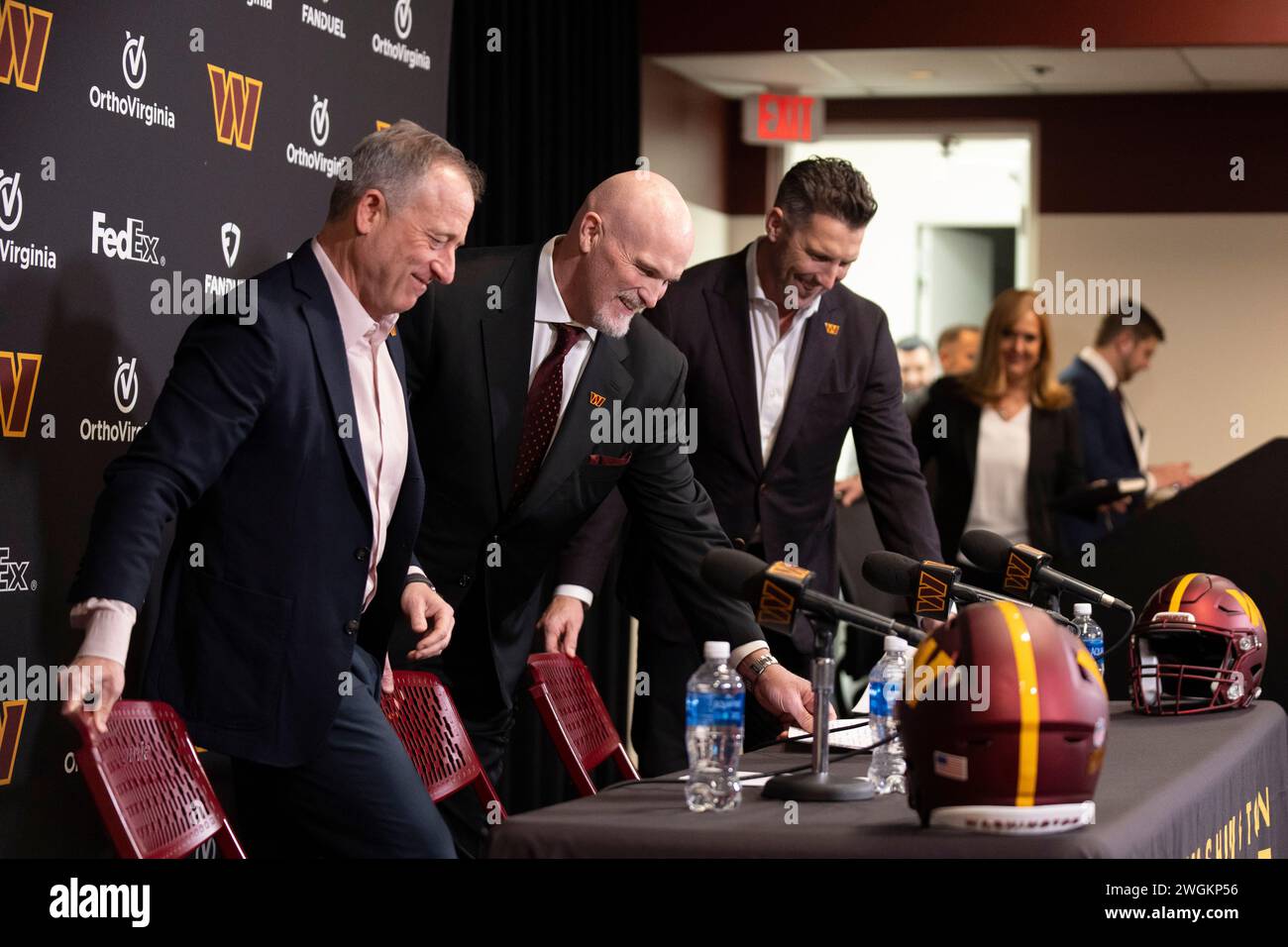 Washington Commanders new head coach Dan Quinn, second from left ...