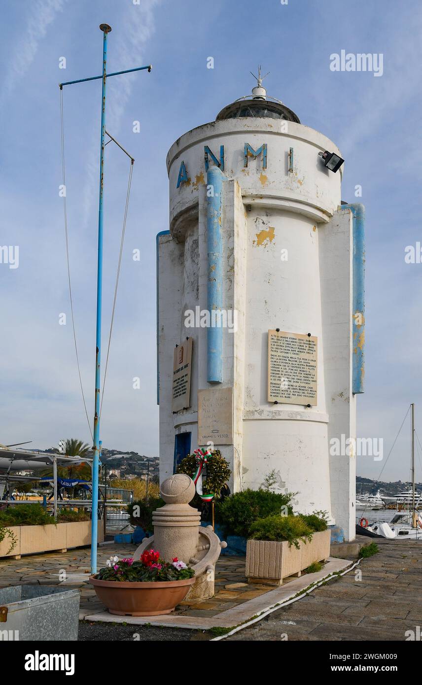 The white lighthouse with the memorial plaque to the Lost at Sea on the ...