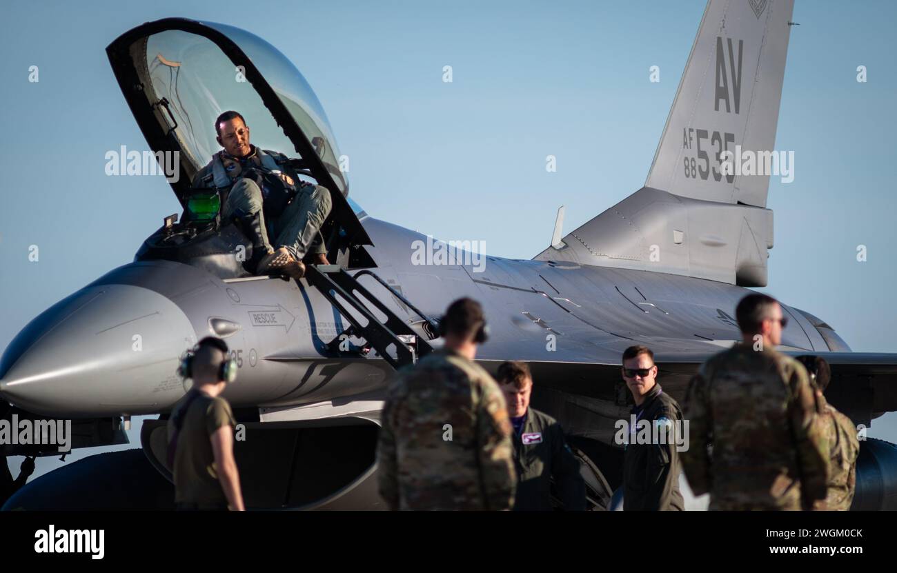 U.S. Air Force pilot Maj. Andre “Guns” Golson carefully climbs out of ...