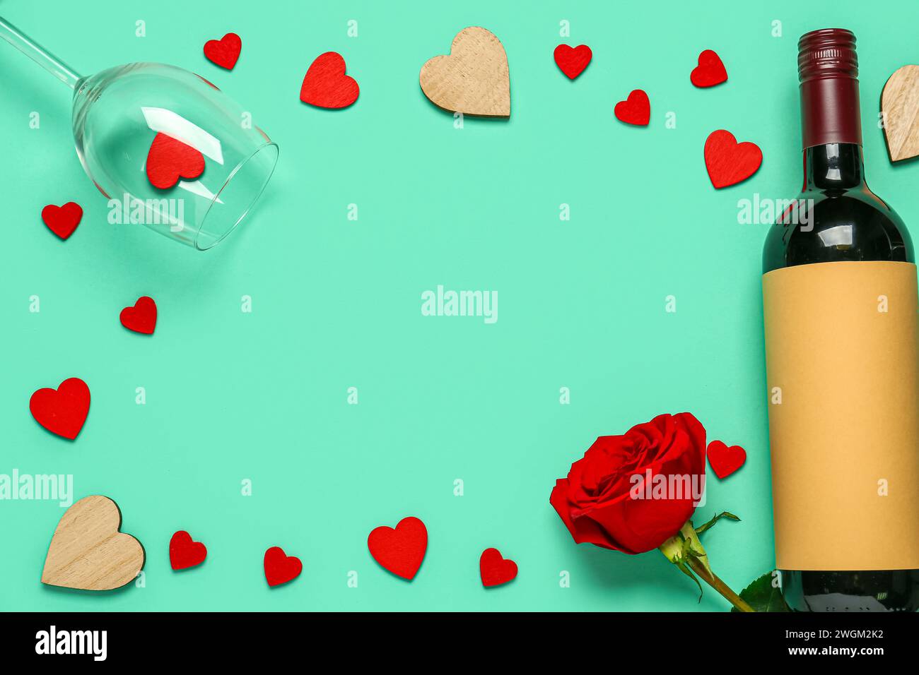 Frame made of bottle with wine, rose flower, hearts and glass for ...