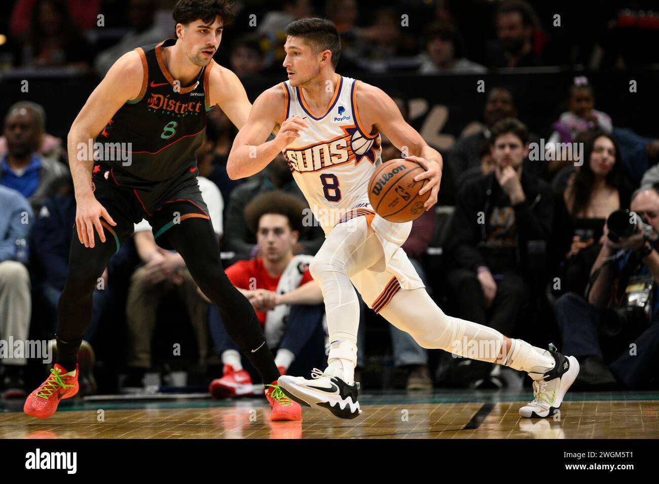 Phoenix Suns guard Grayson Allen, right, in action during the first ...