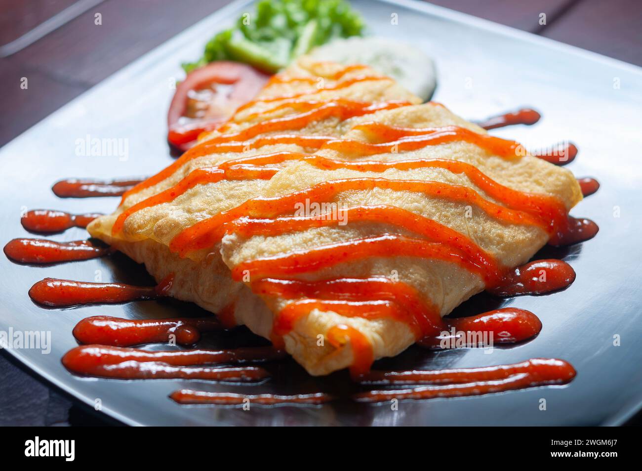 Pattaya fried rice is made from fried rice and then covered with beaten ...