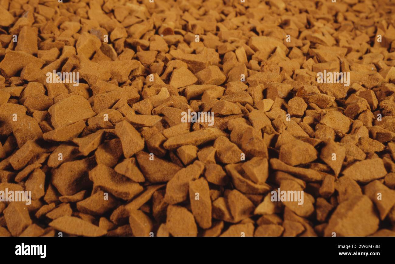 Instant granulated coffee close-up. Coffee granules texture. Coffee ...